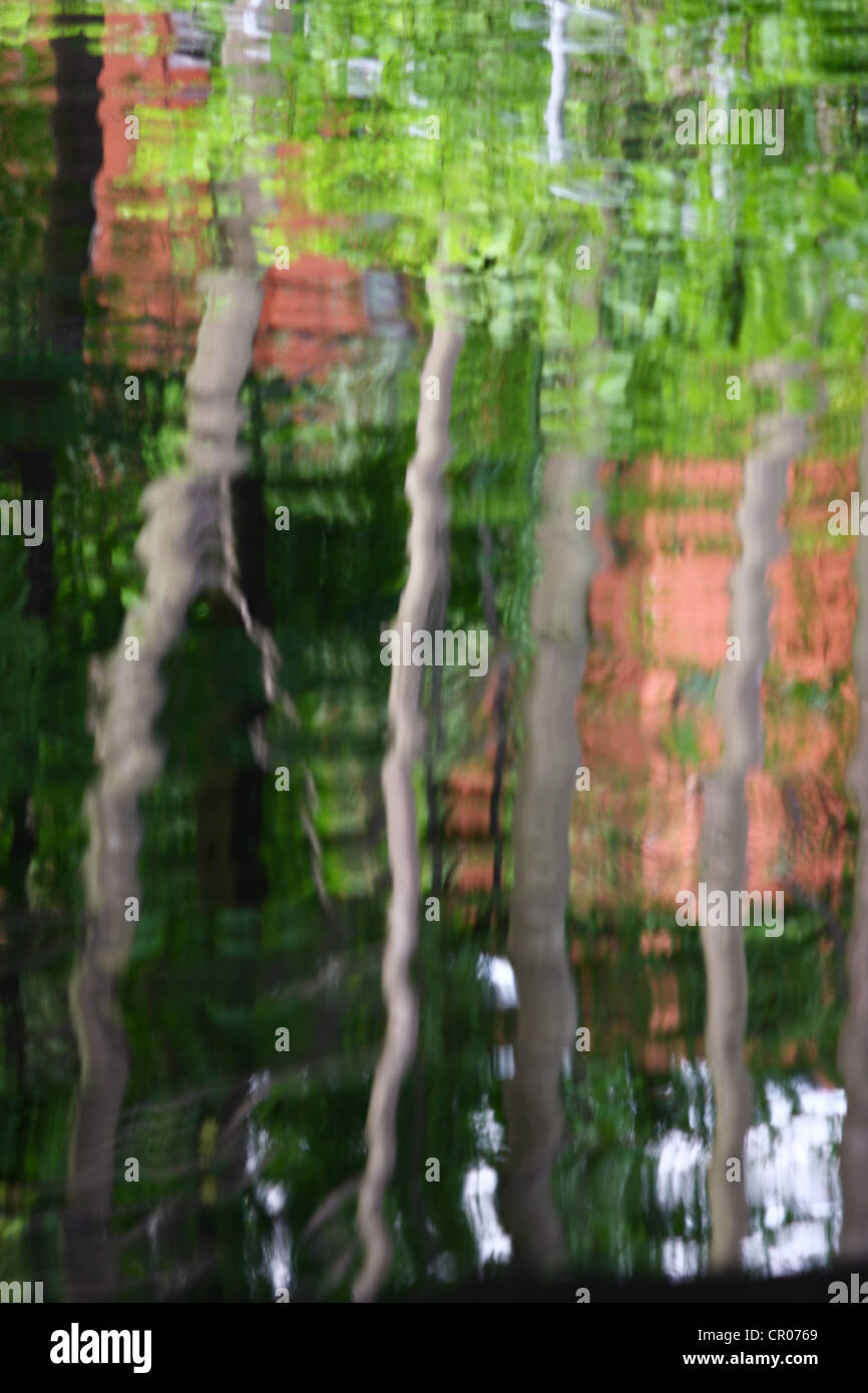 reflections of a riverbank Stock Photo - Alamy