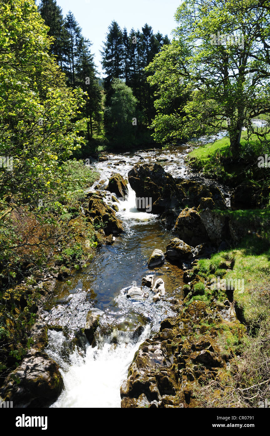 The River Tweed as it passes by the village of Tweedsmuir, Dumfries ...