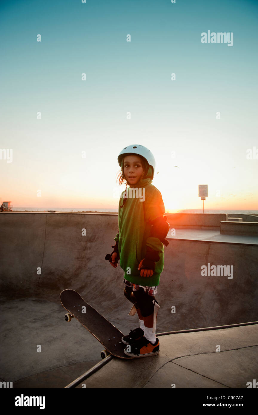 Boy skating at skatepark Stock Photo - Alamy
