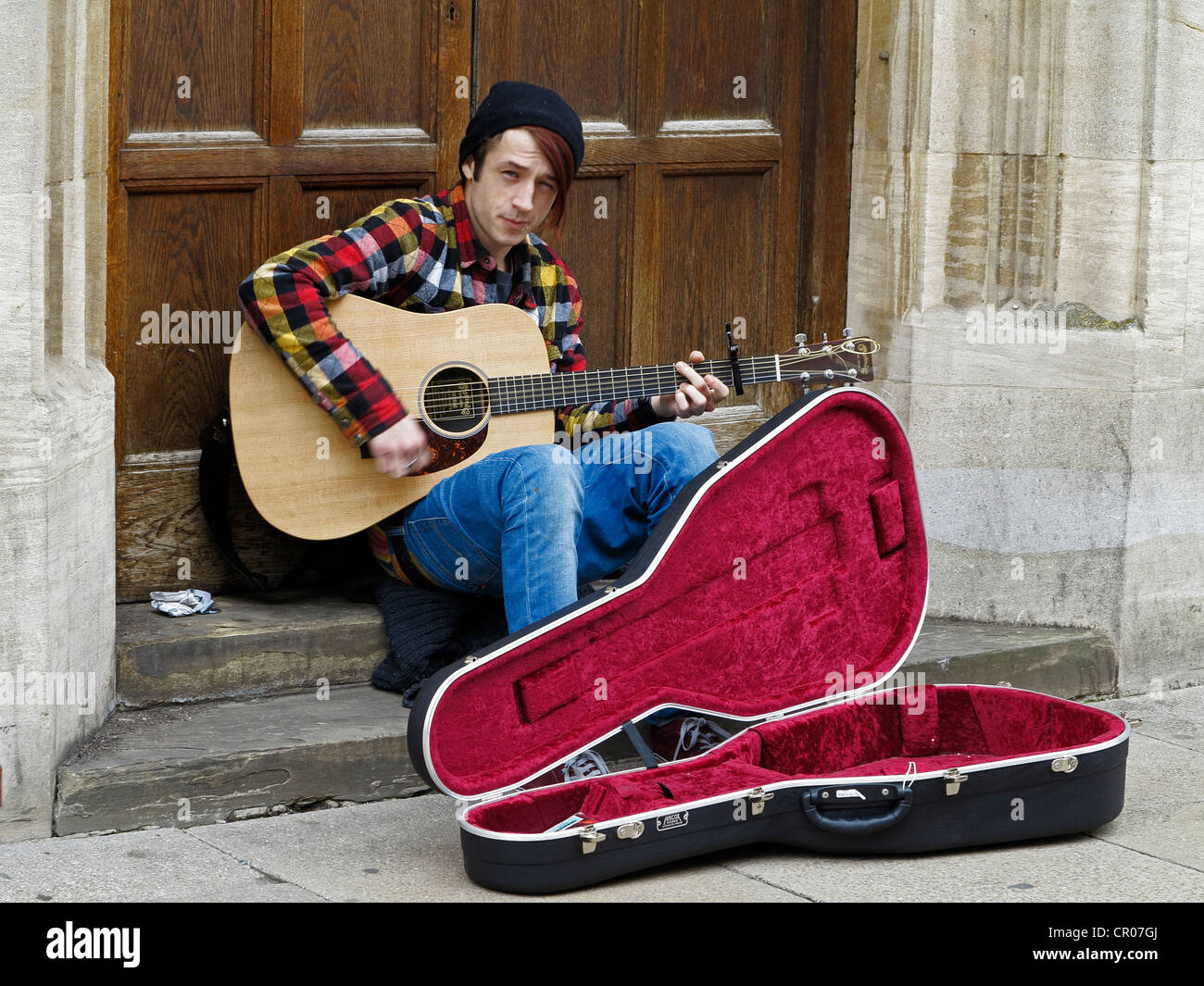 Busker with guitar Cambridge Stock Photo - Alamy