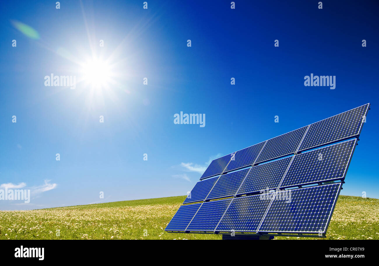 Solar panel with sun Stock Photo - Alamy