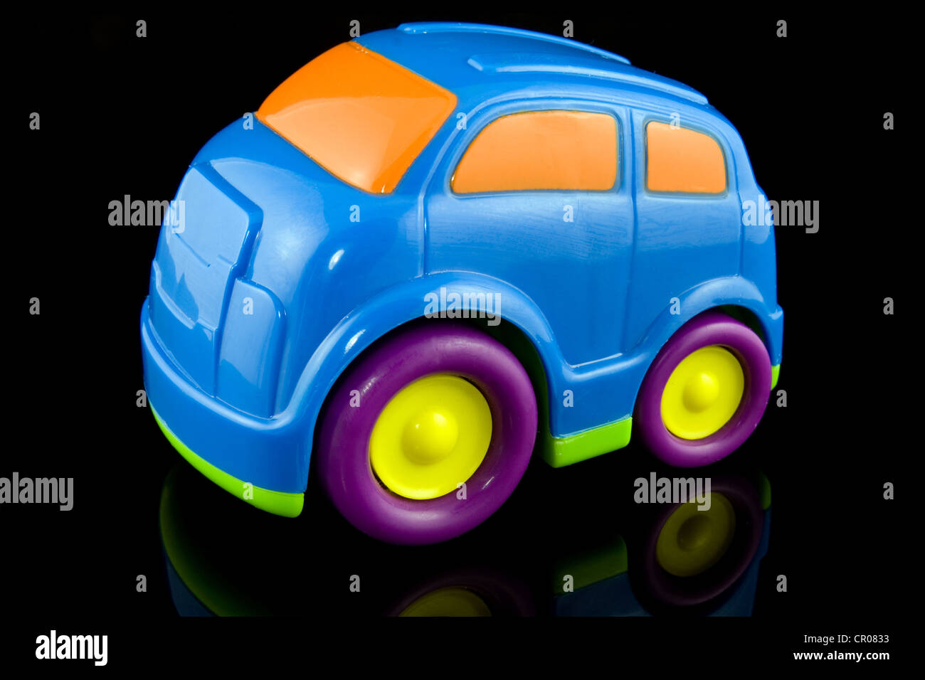 blue plastic car on black background with reflection Stock Photo - Alamy