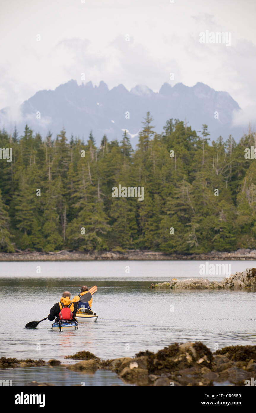 Kayakers in rural lake Stock Photo - Alamy