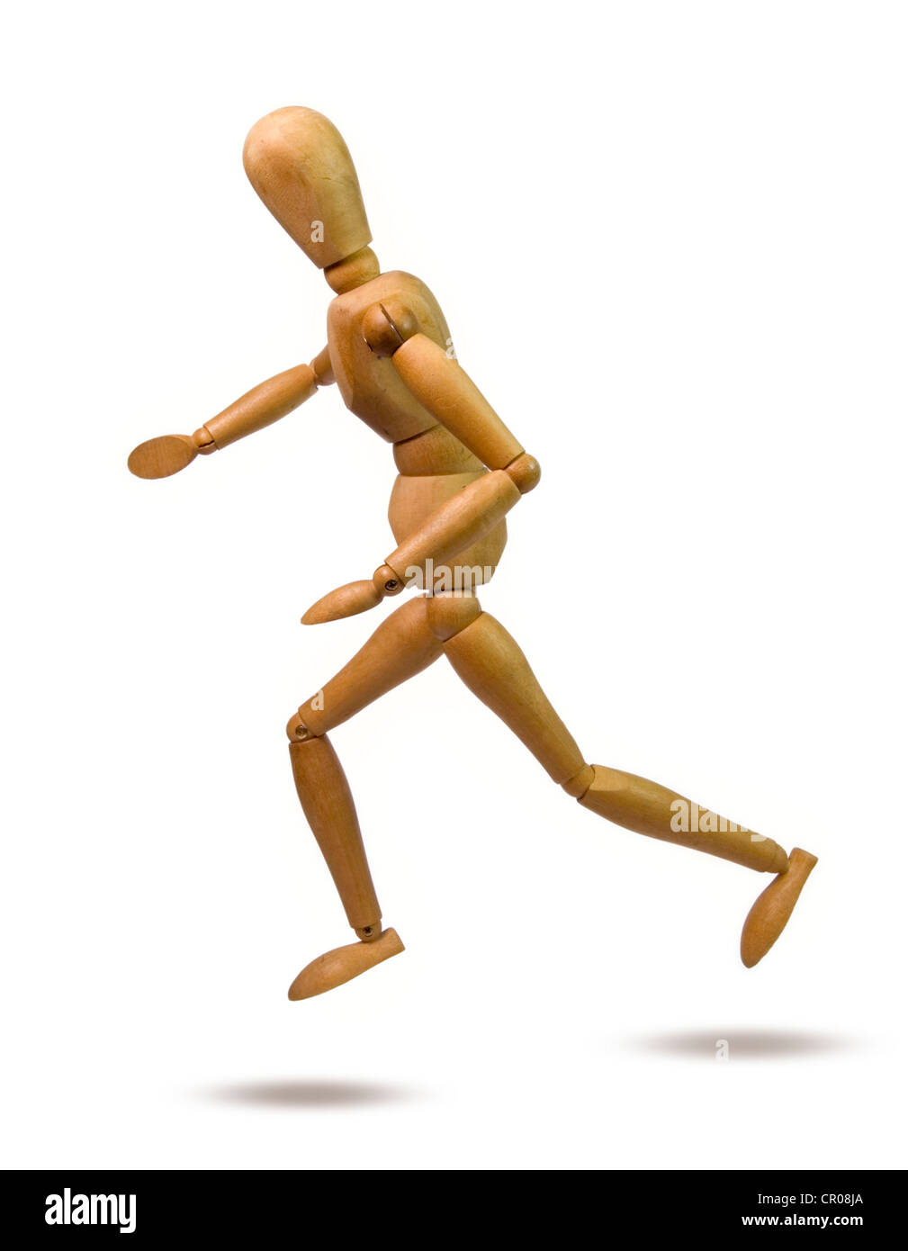 wooden dummy running fast Stock Photo - Alamy