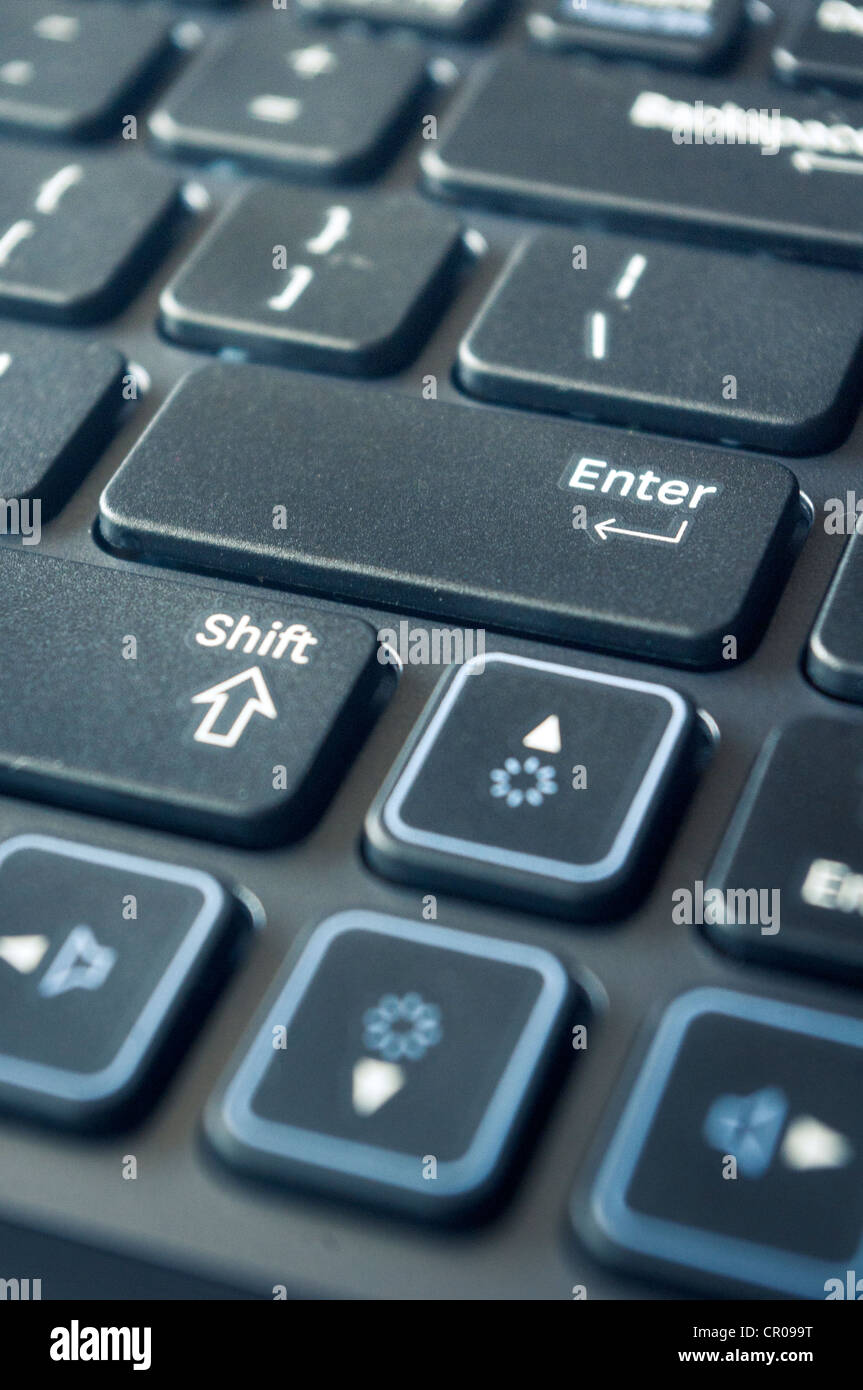 a close up shot of keyboard enter button key, for conceptual usage ...