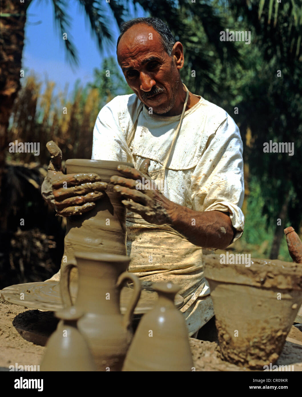 Egypt. Cairo. Pharaonic village. Man making clay pots Stock Photo - Alamy