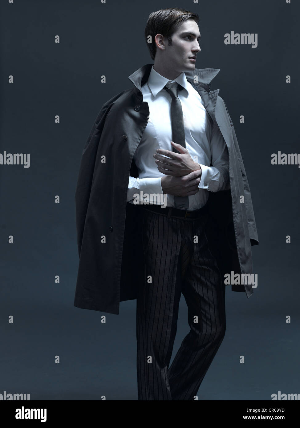 Businessman in suit contemplates hi-res stock photography and images ...
