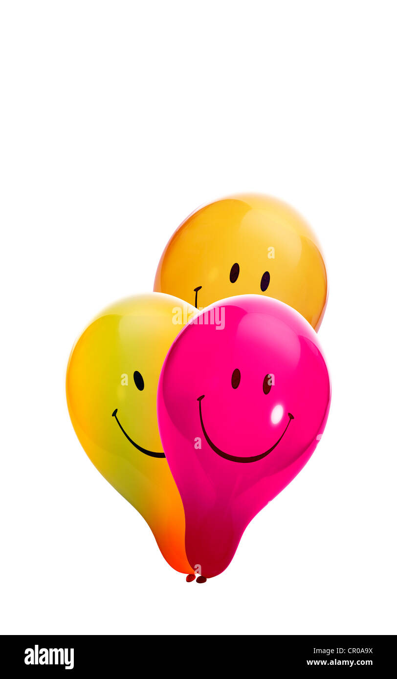 Three coloured smiley balloons Stock Photo - Alamy