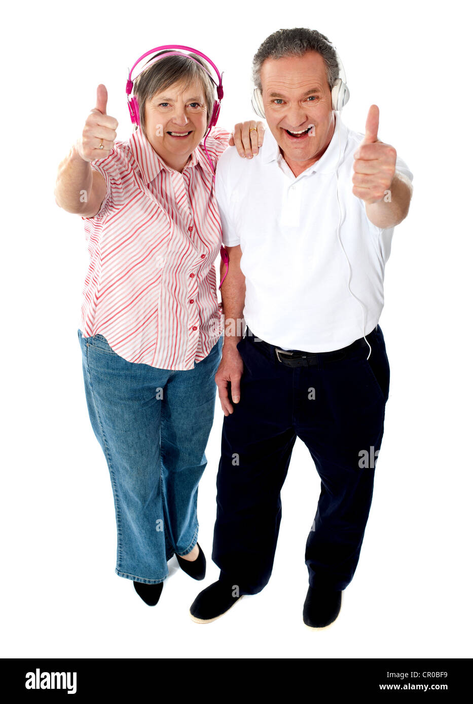 Thumbs-up couple tuned into music, isolated over white Stock Photo - Alamy