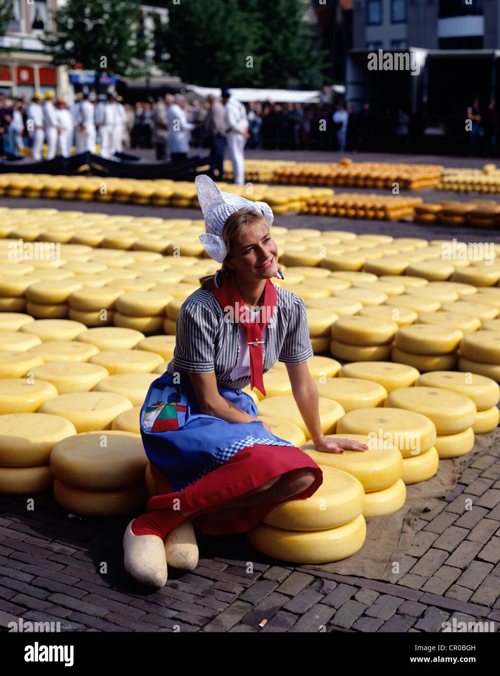 Netherlands. Alkamaar Cheese Market. Young woman in traditional costume ...