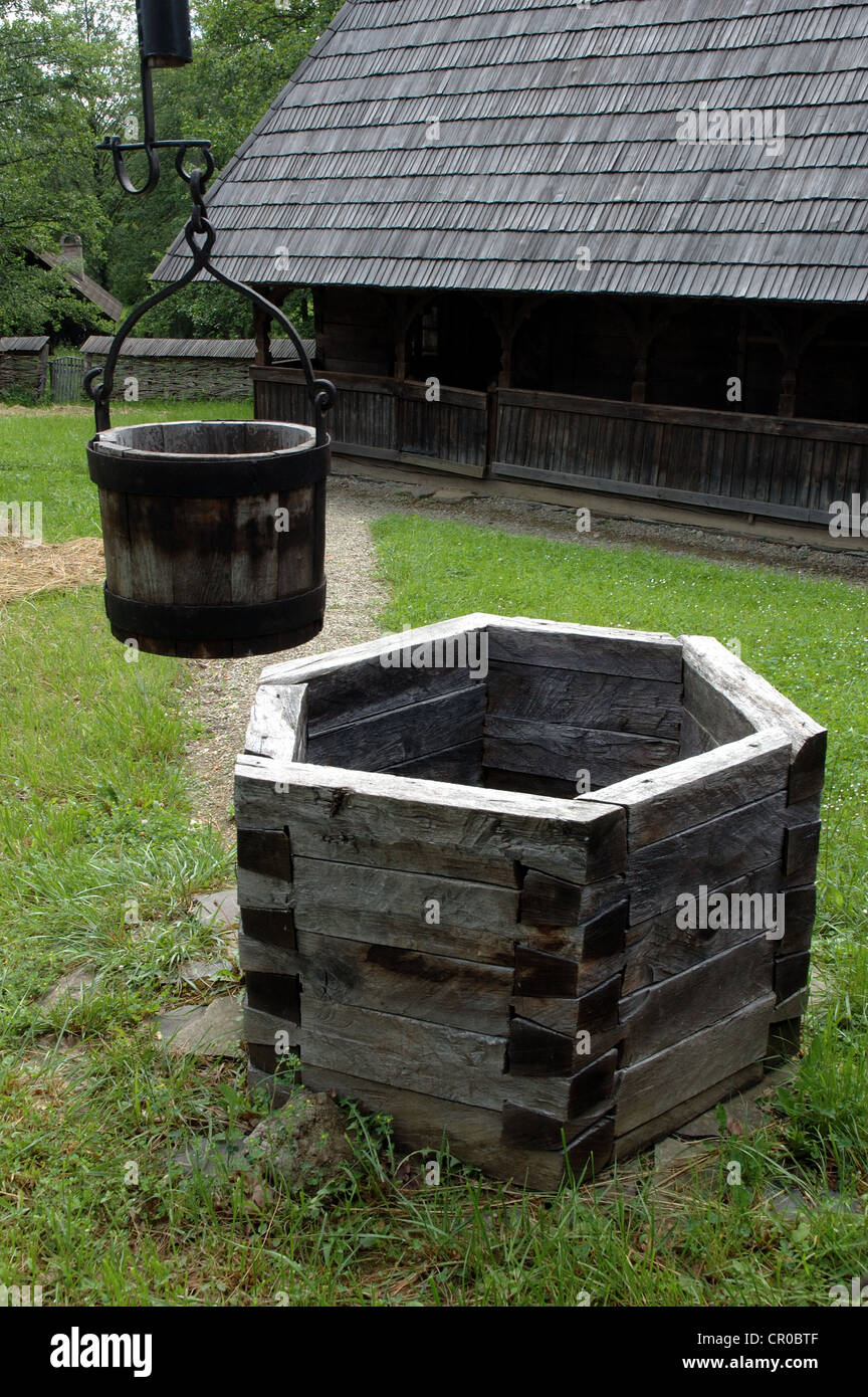 Rustic wooden well at Astra open air museum, Sibiu, Romania Stock Photo ...