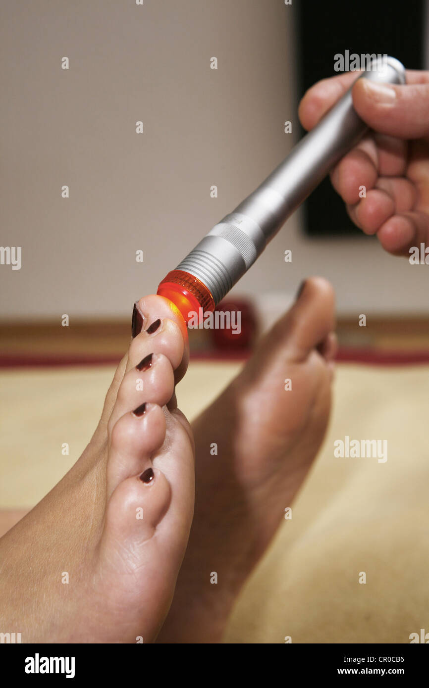 Color treatment, female foot Stock Photo - Alamy