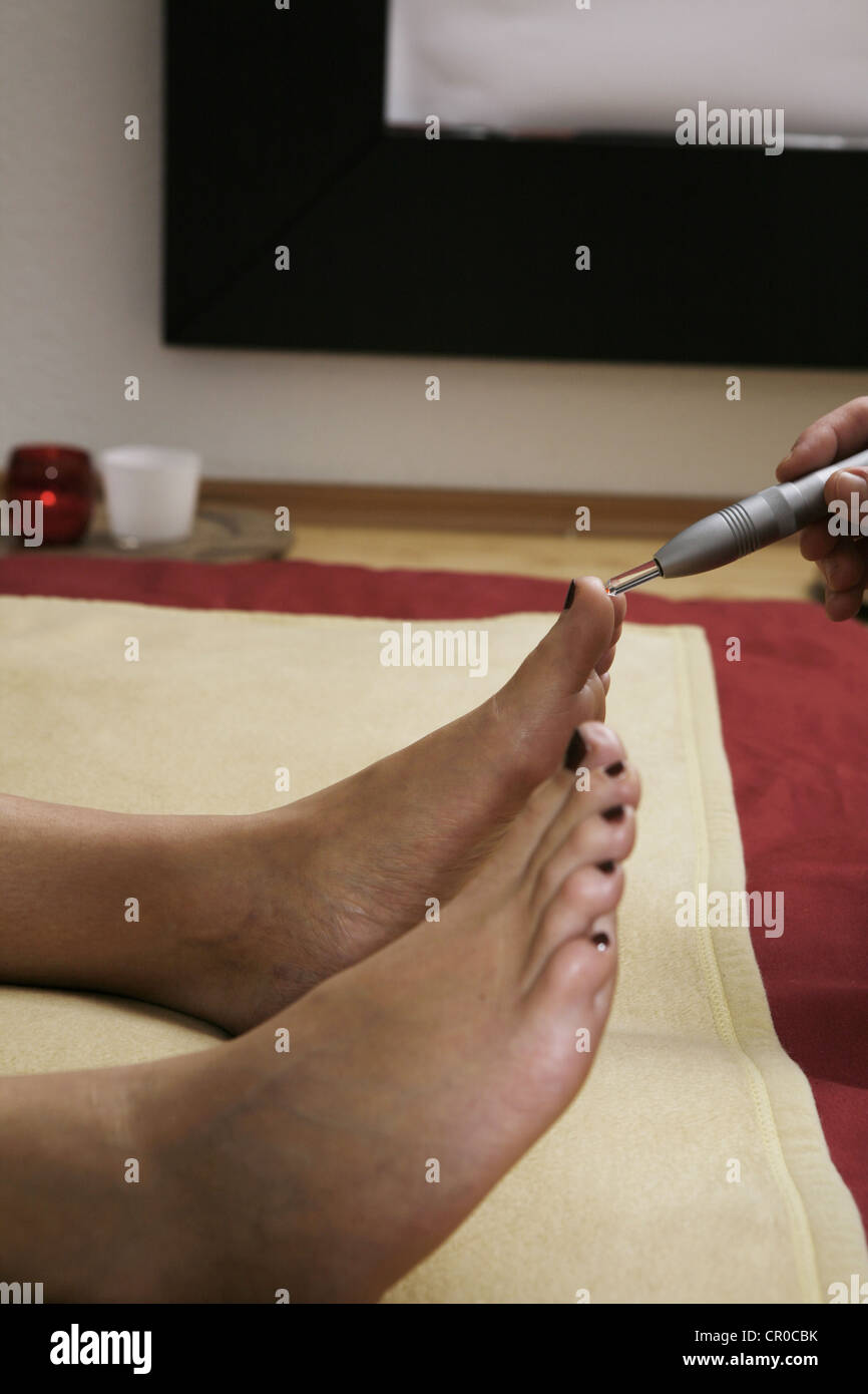Color treatment, female feet Stock Photo - Alamy
