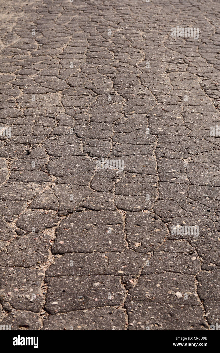 The old cracked asphalt road Stock Photo - Alamy