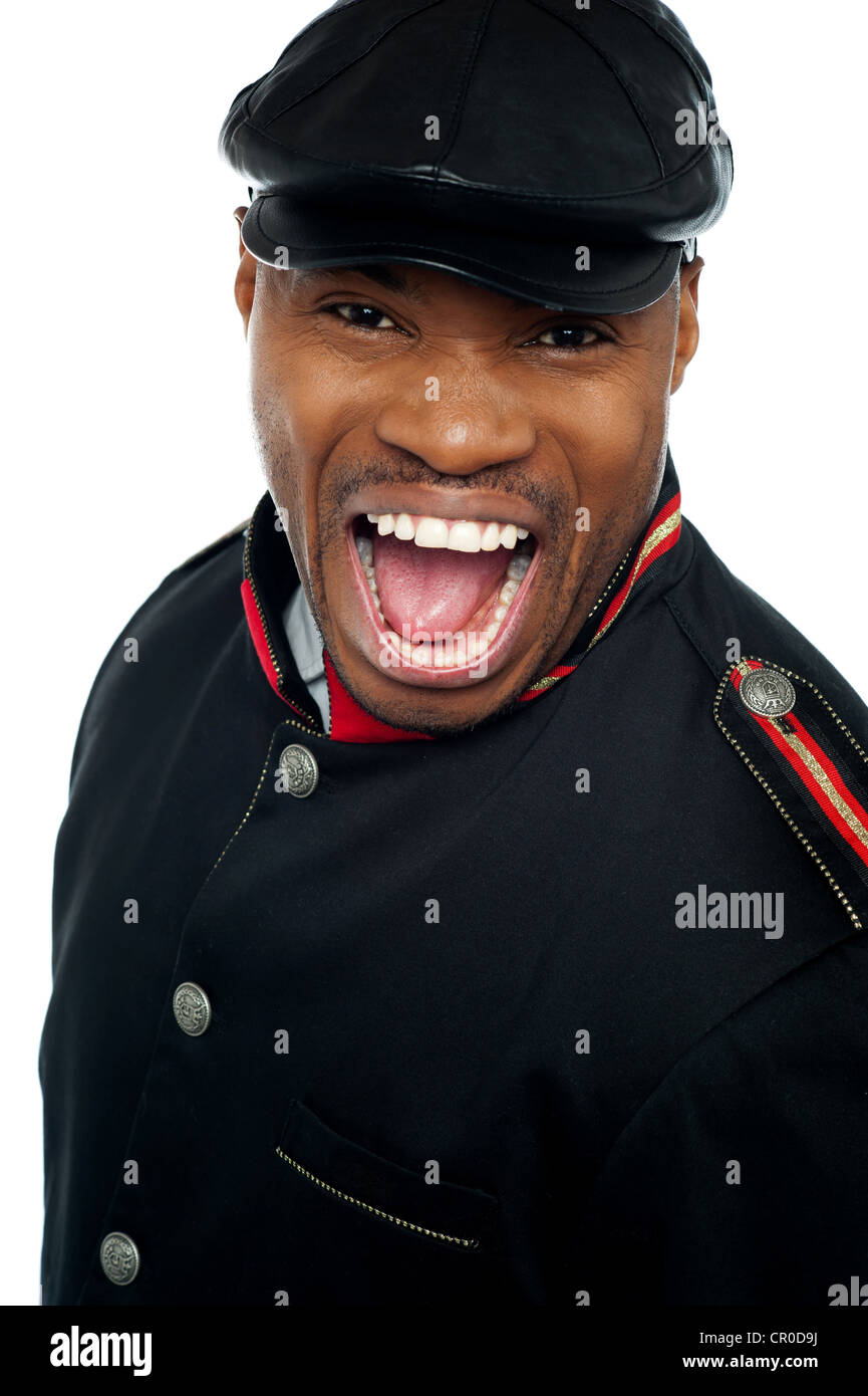 Shouting african man wearing cap isolated over white. Closeup shot ...