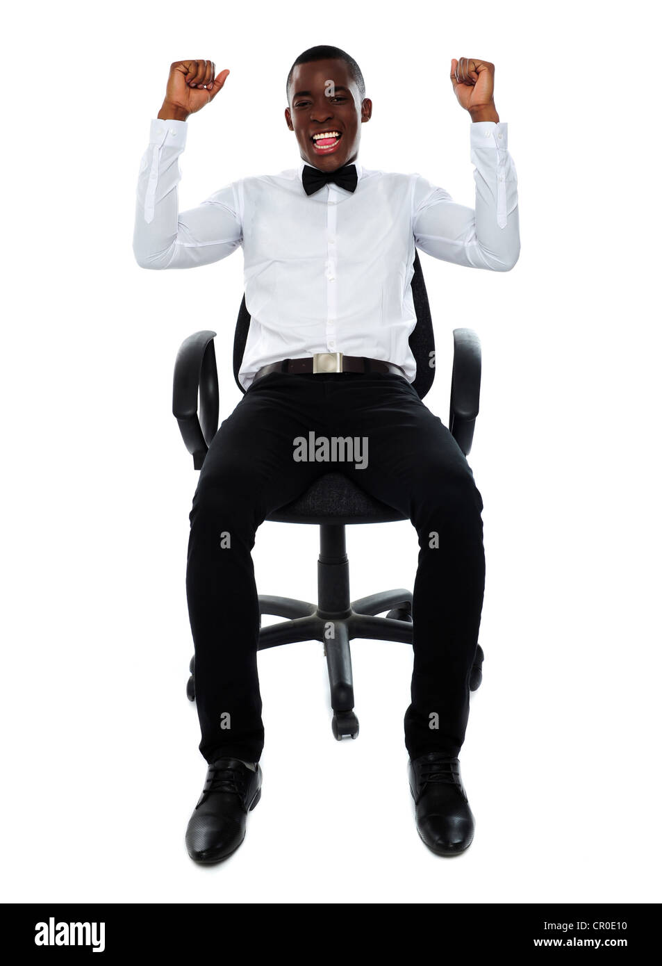 Excited successful business male sitting on chair Stock Photo - Alamy Excited successful business male sitting on chair Stock Photo - Alamy