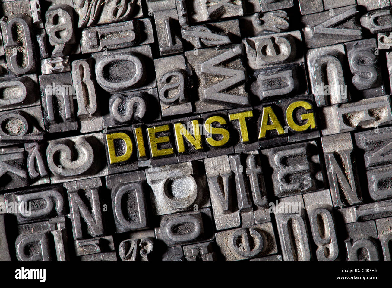 The word "Dienstag", German for "Tuesday", made of old lead type Stock ...