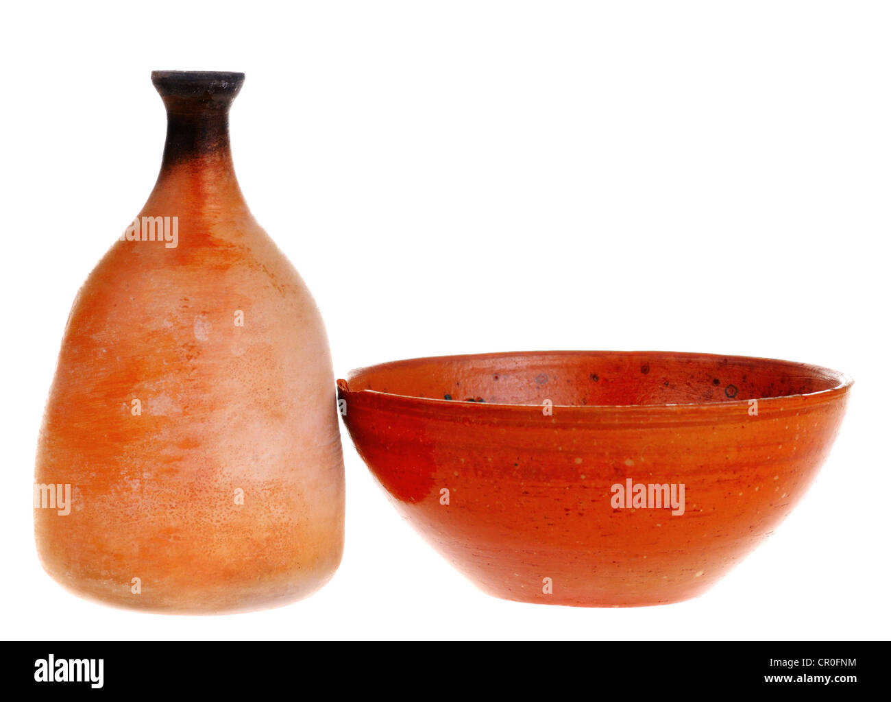 Old-fashioned clay jag and dish on white background Stock Photo - Alamy