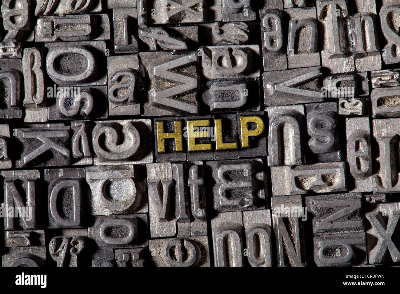 The word "help", made of old lead type Stock Photo - Alamy