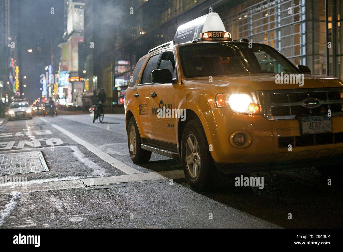 A taxi is out late at night in New York City Stock Photo - Alamy