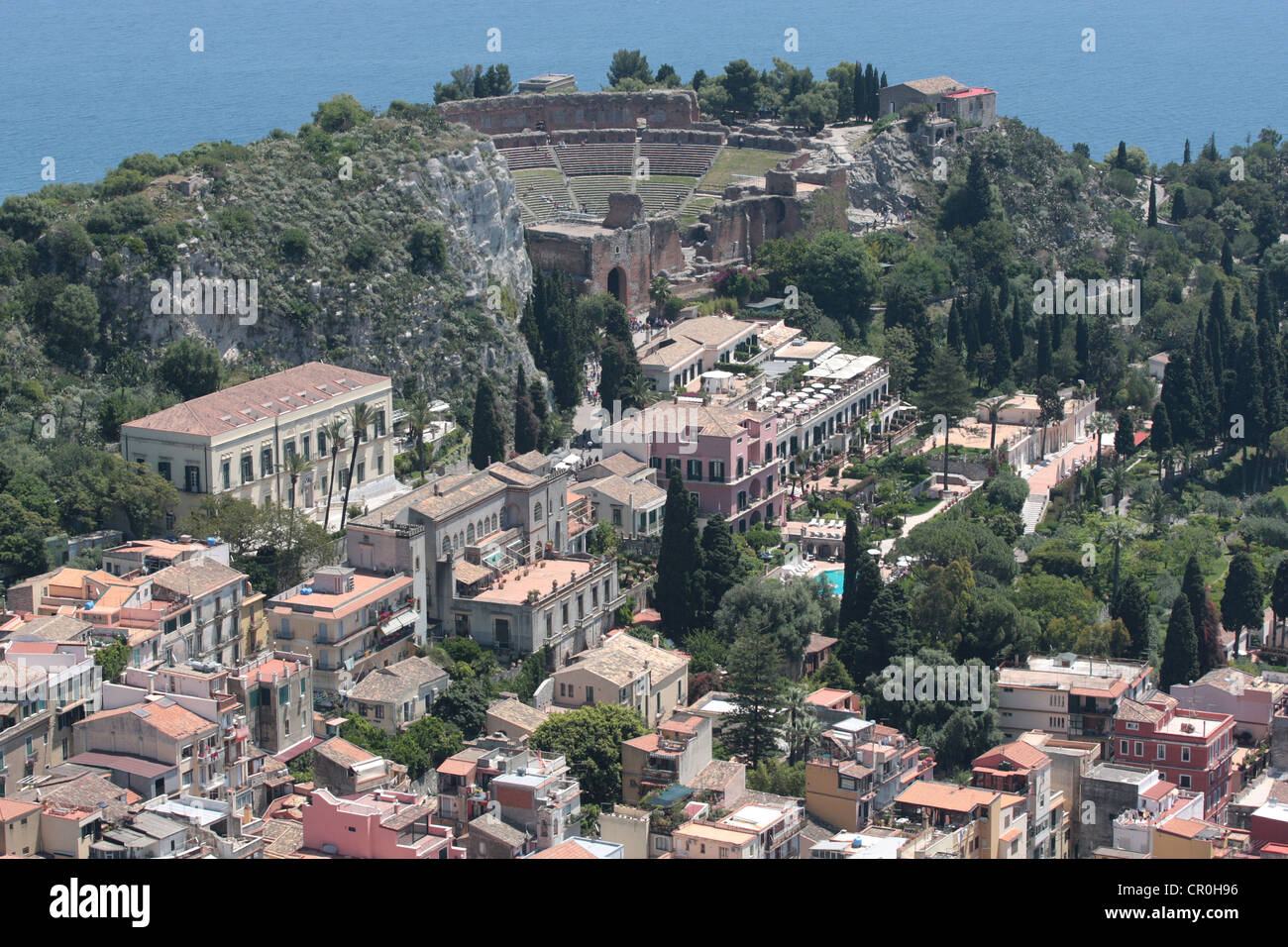 View of Taormina city and the''Teatro Greco'' or Greek theatre, Sicily ...