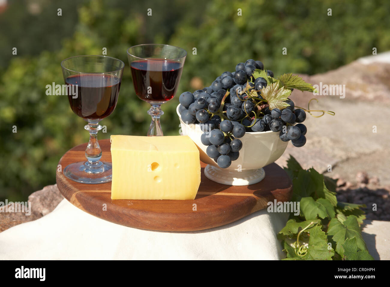 Still life, food with wine, grapes, wine bottle, wine glasses, on a ...