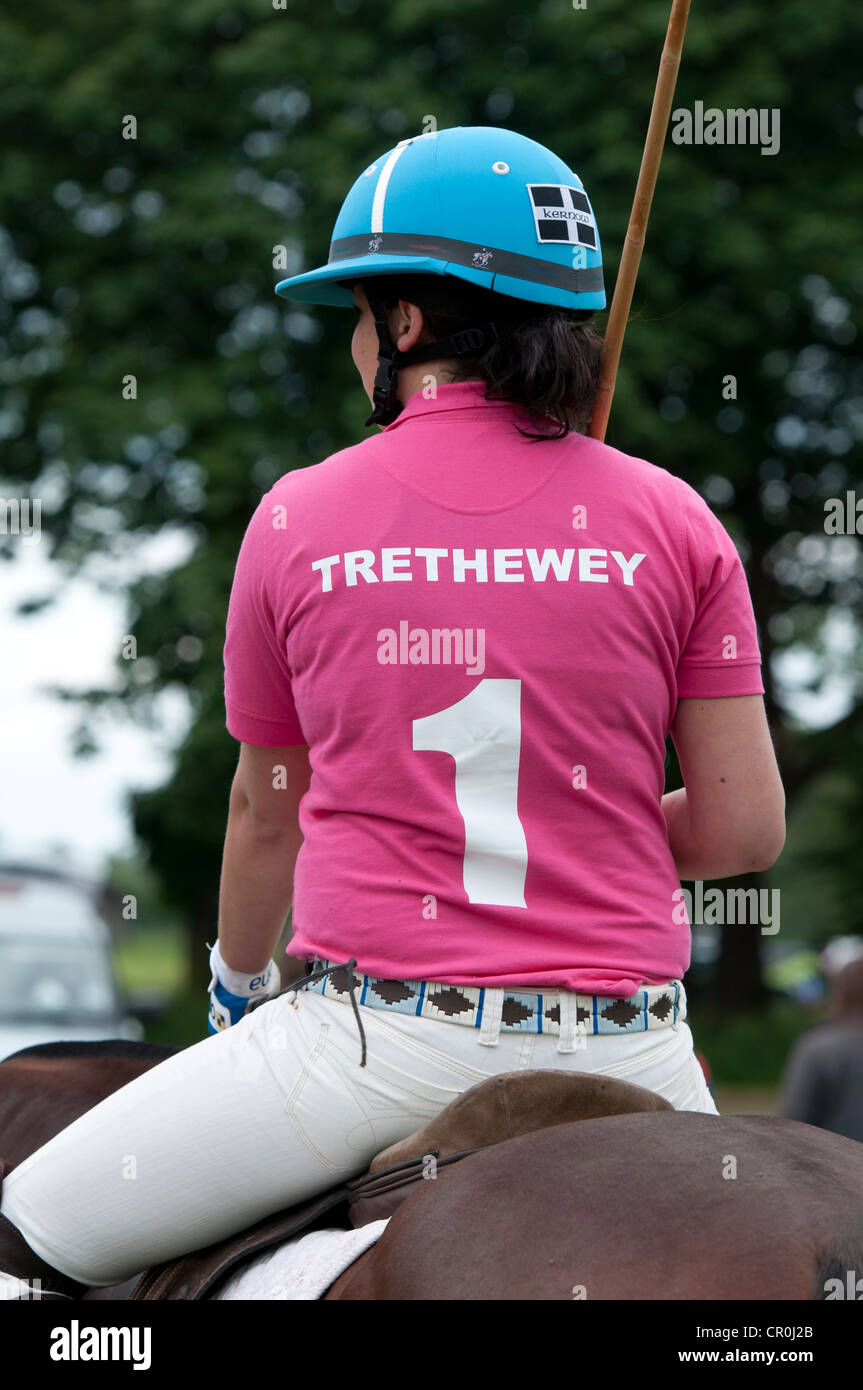 Young female student polo player Stock Photo - Alamy