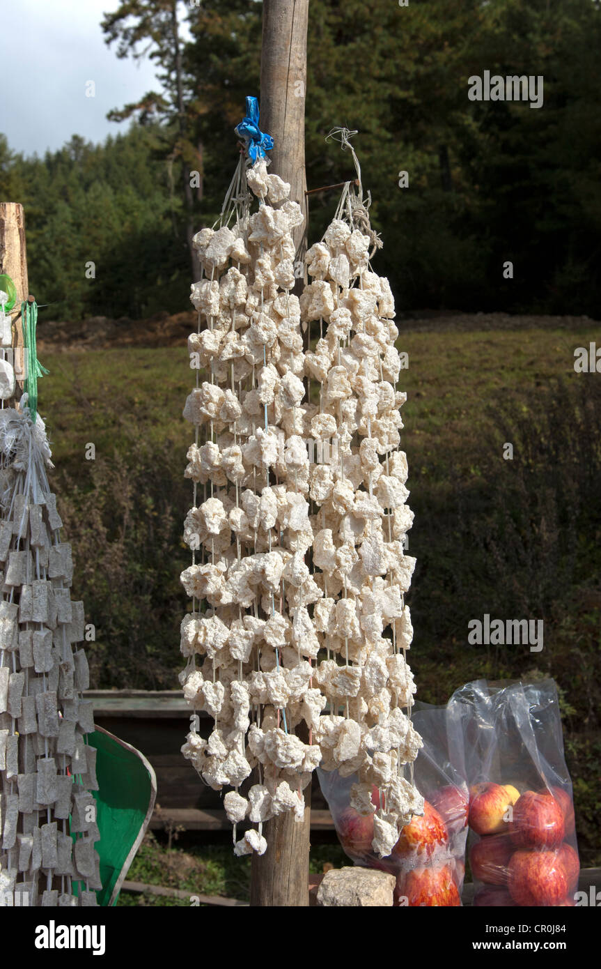 Bhutanese Churpi or Chugui snack, made of dried cheese, at a market ...