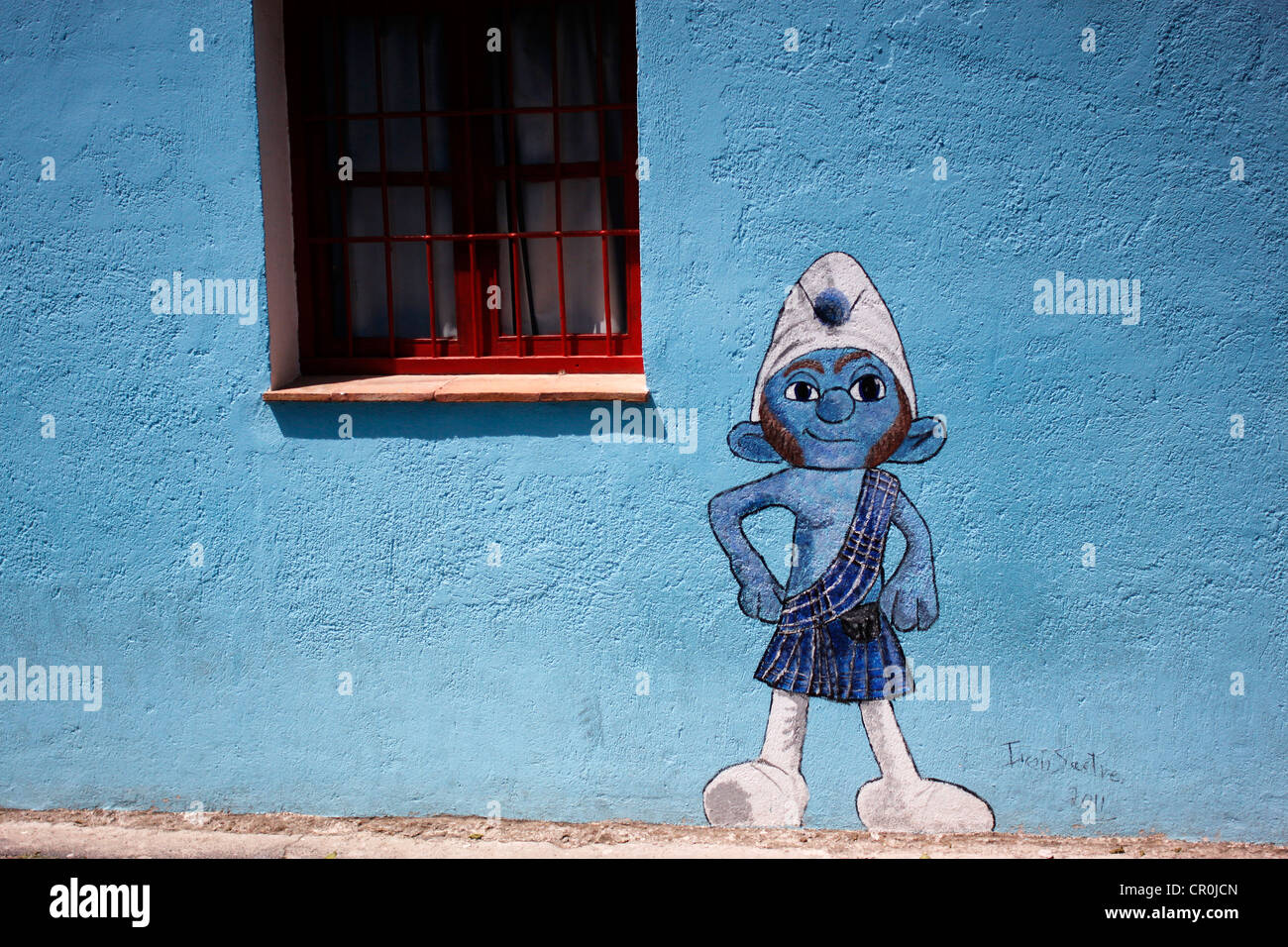 A painting of a smurf dressed with the Scotland's national dress ...