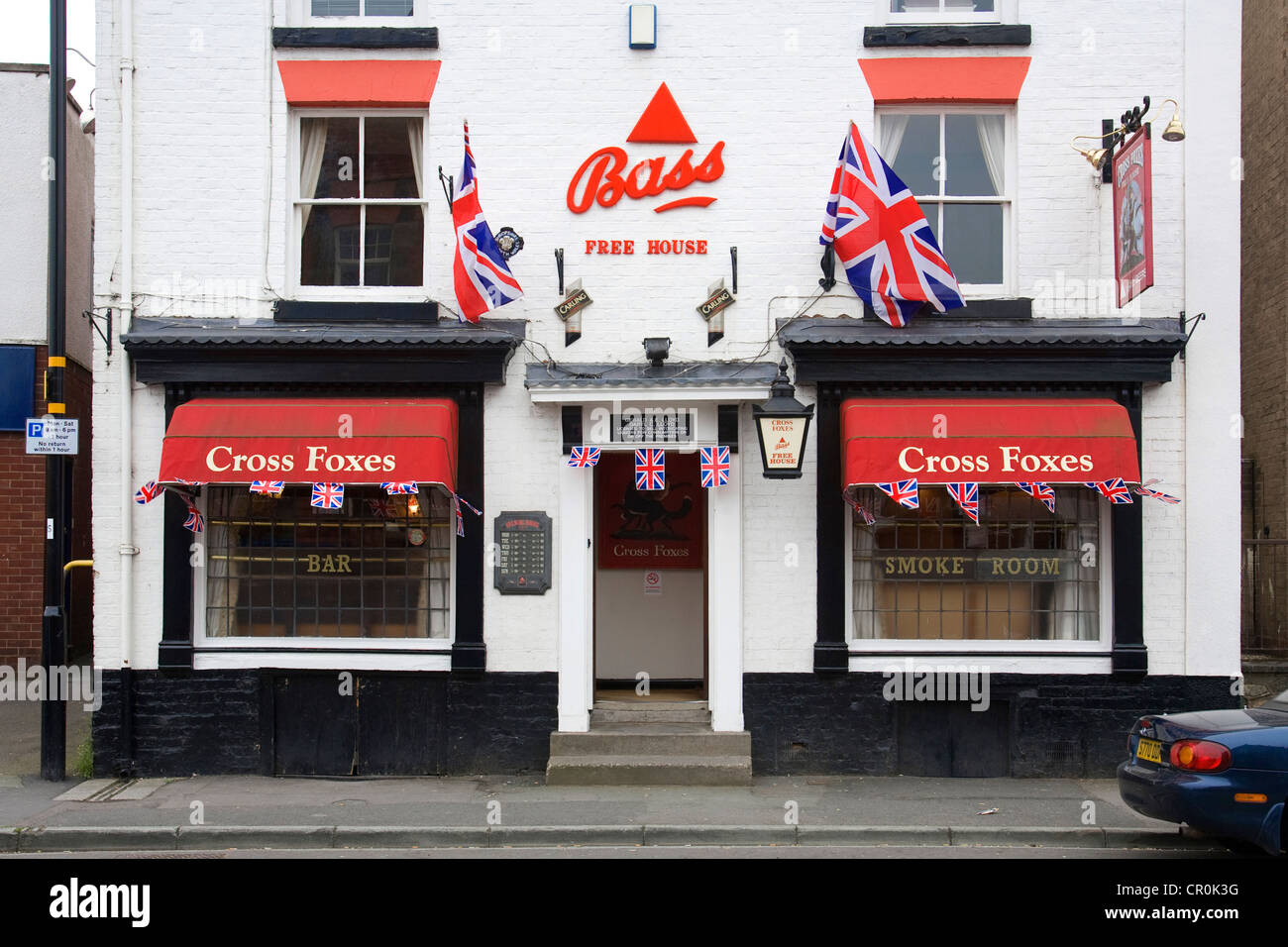 Front of a Great British public house with Union Flags flying. Pubs in ...