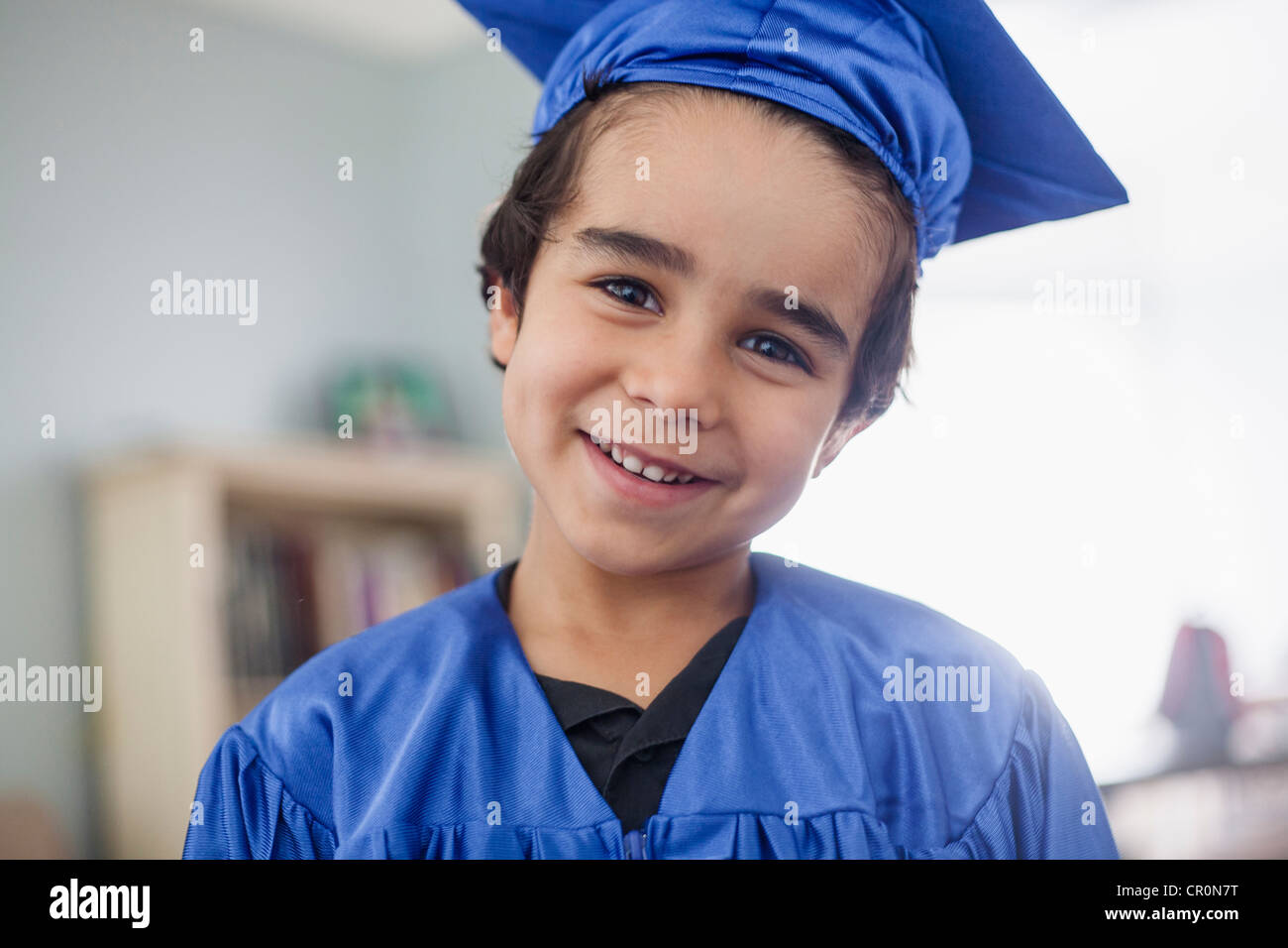 Portrait boy in graduation gown hi-res stock photography and images - Alamy