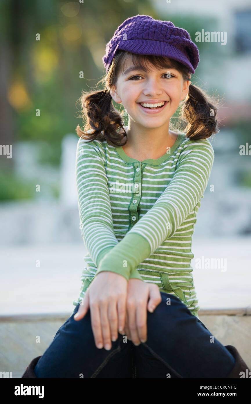 Smiling Caucasian girl in cap Stock Photo - Alamy