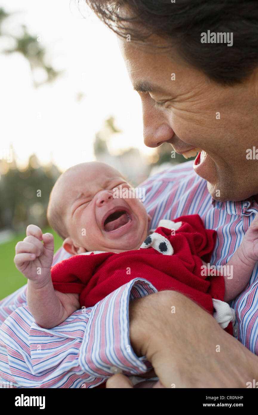 Mature father holding sad hi-res stock photography and images - Alamy