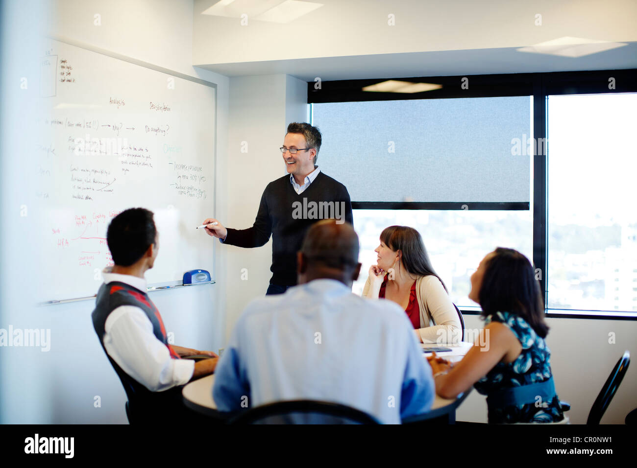 Business people having meeting in conference room Stock Photo - Alamy