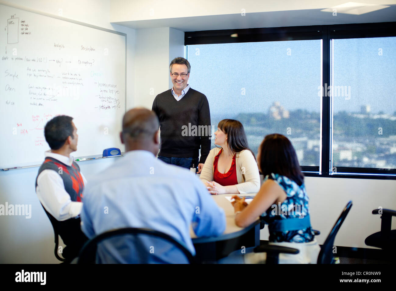 Business people having meeting in conference room Stock Photo - Alamy