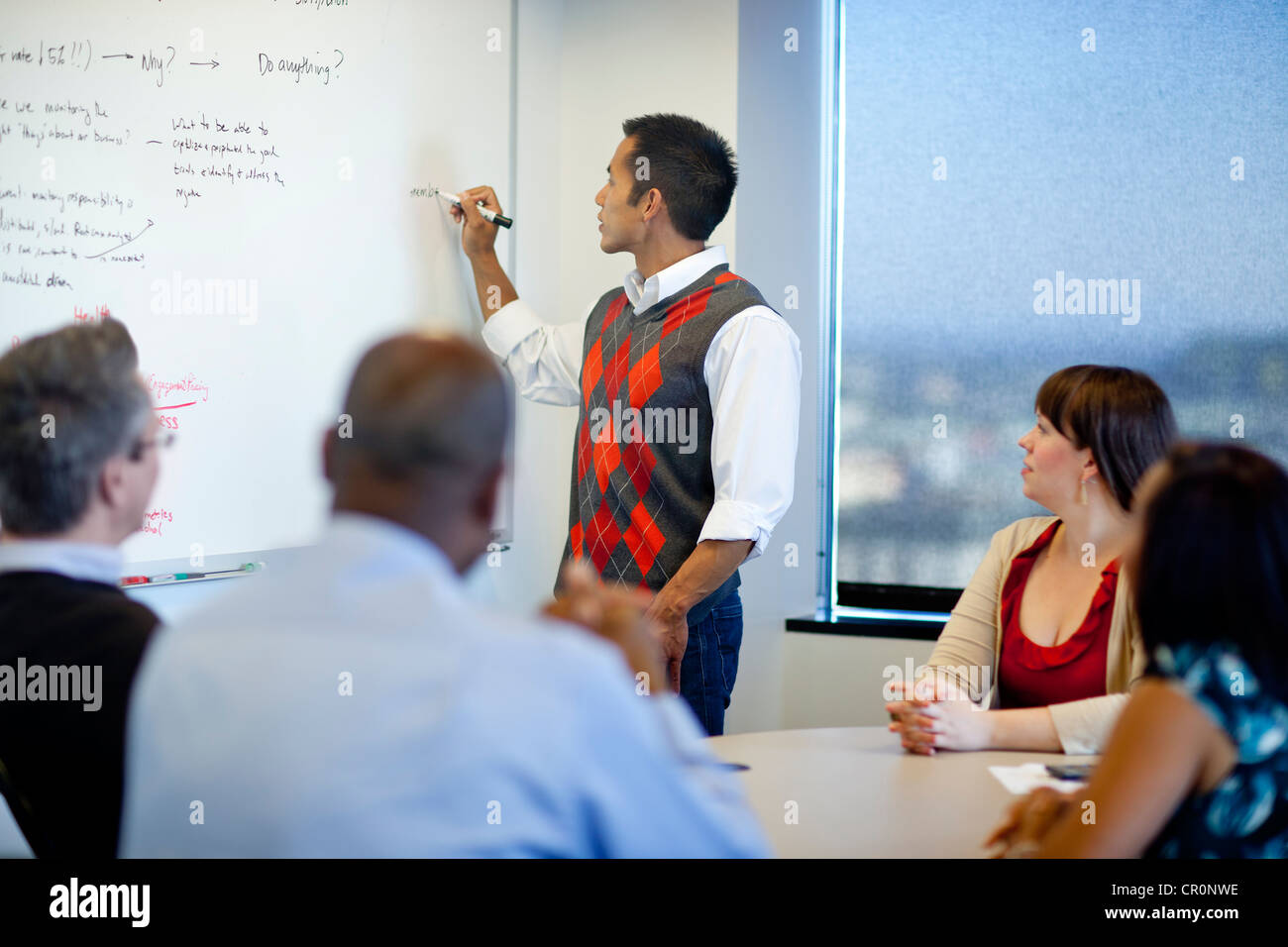 Business people having meeting in conference room Stock Photo - Alamy