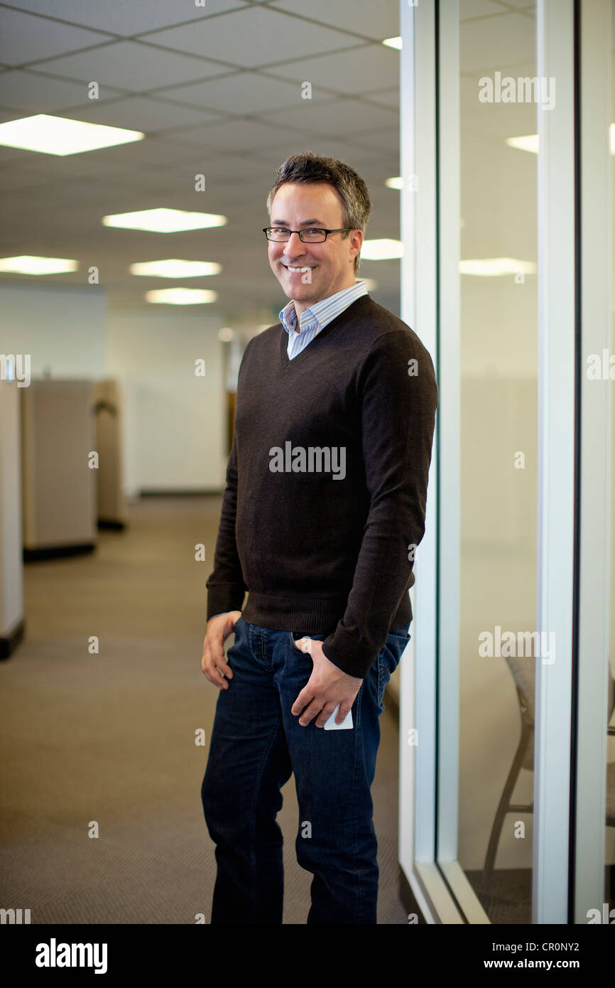 Portrait caucasian businessman standing smiling hi-res stock ...