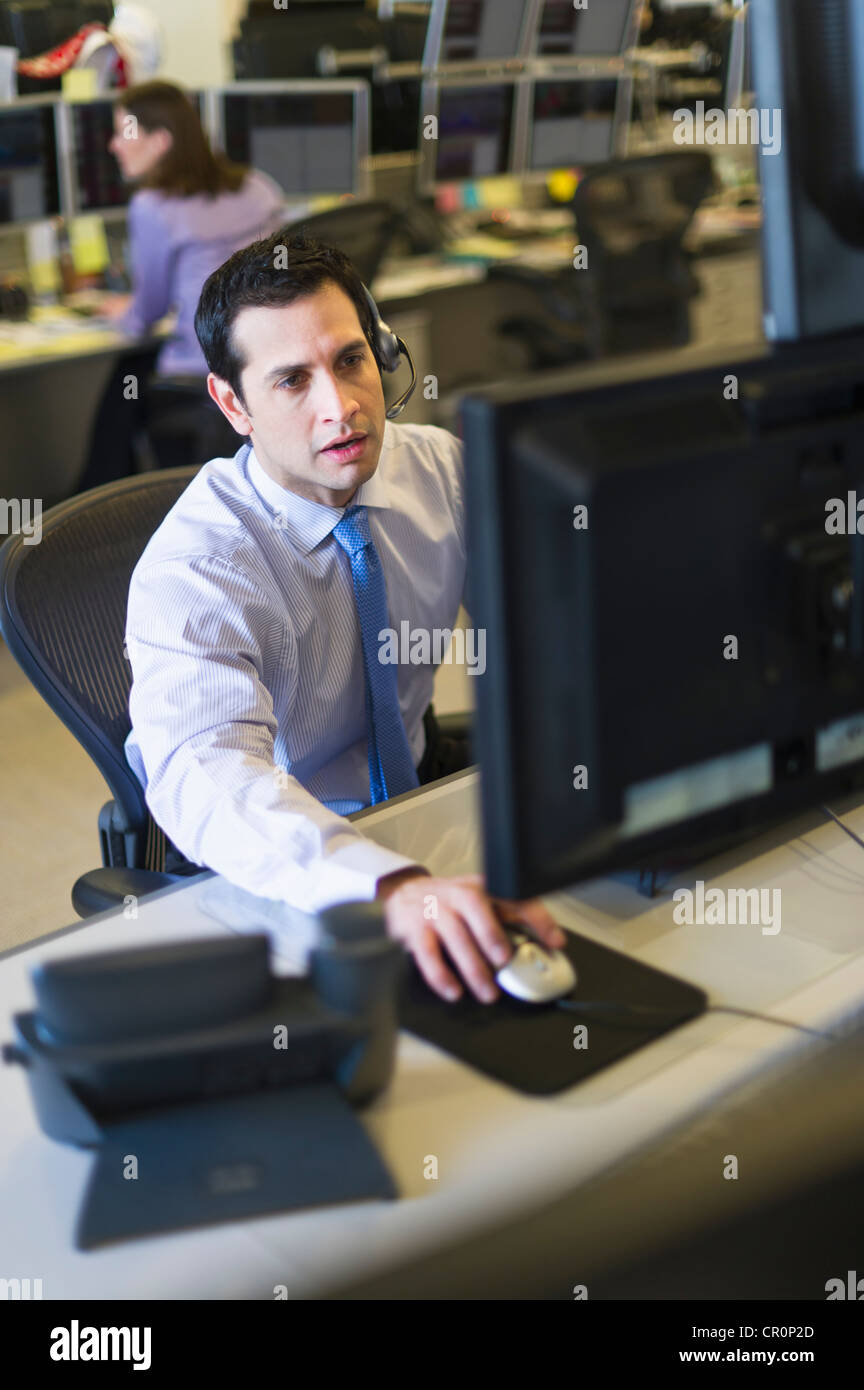 City trader working at trading screen hi-res stock photography and ...