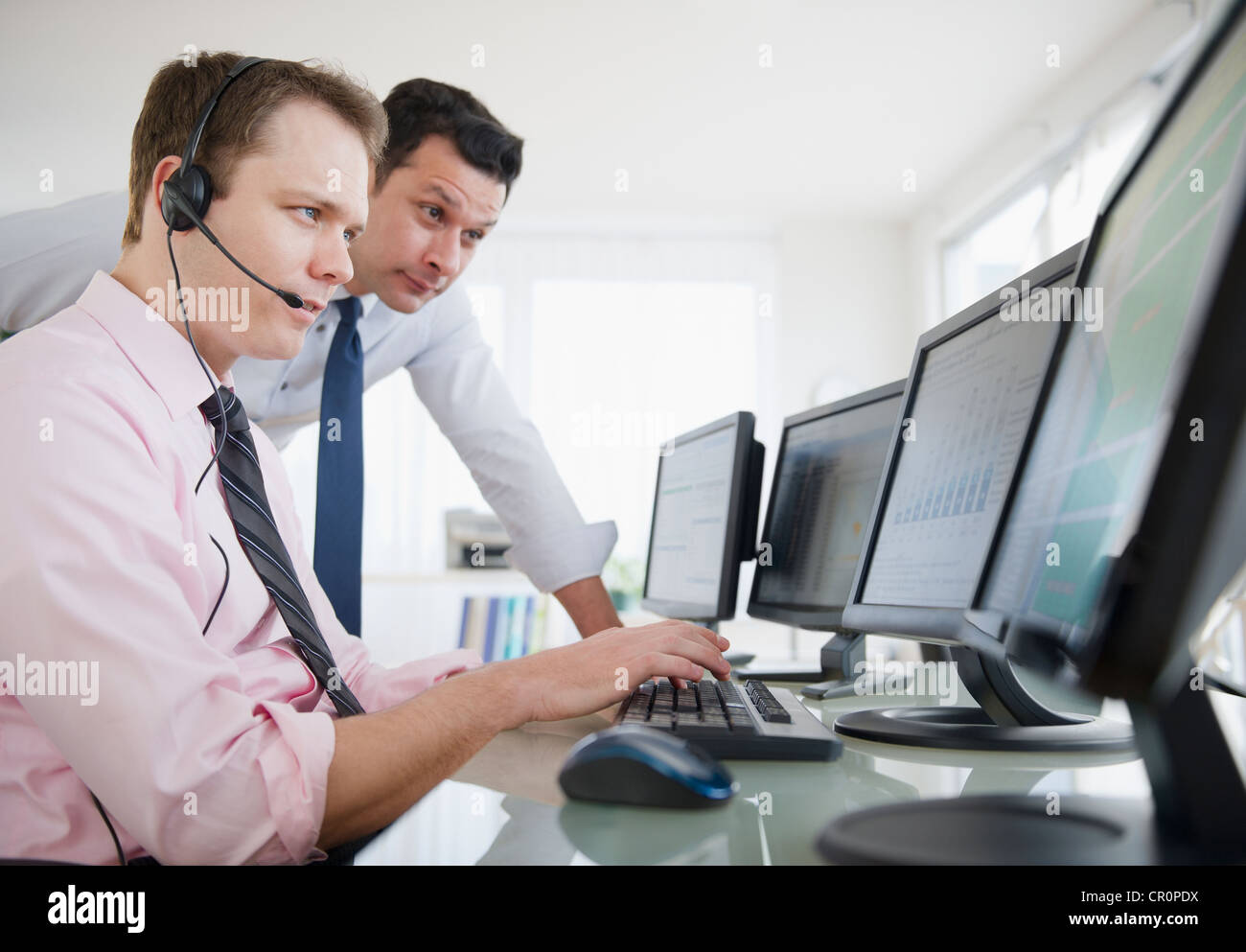 Monitors multi ethnic hi-res stock photography and images - Alamy