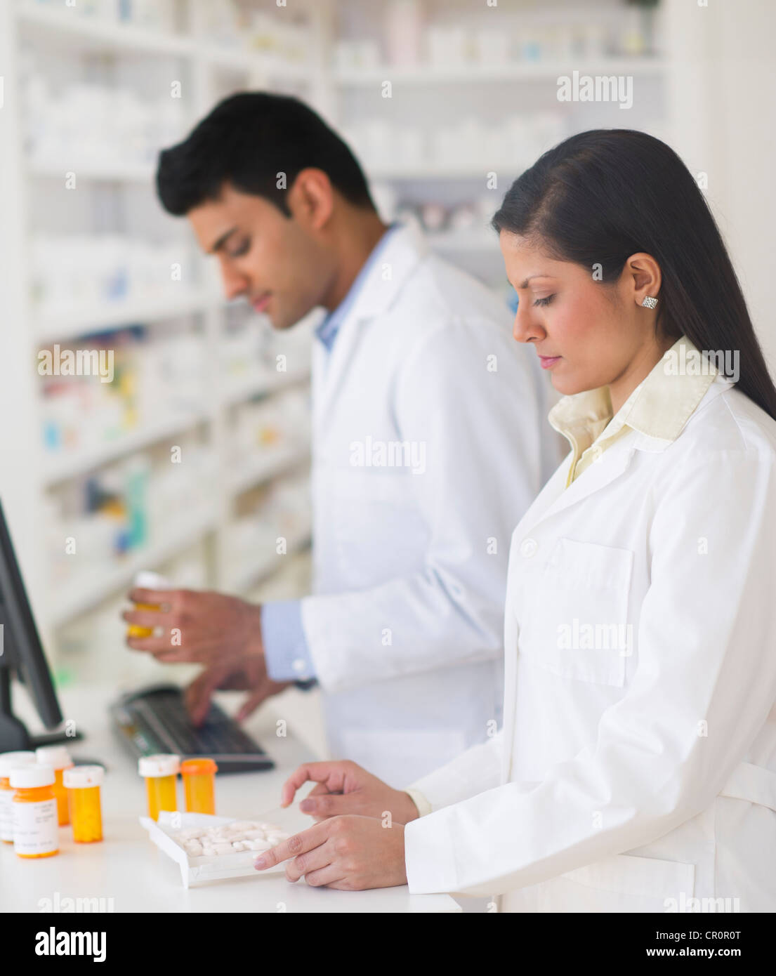 Two pharmacists in white hi-res stock photography and images - Alamy