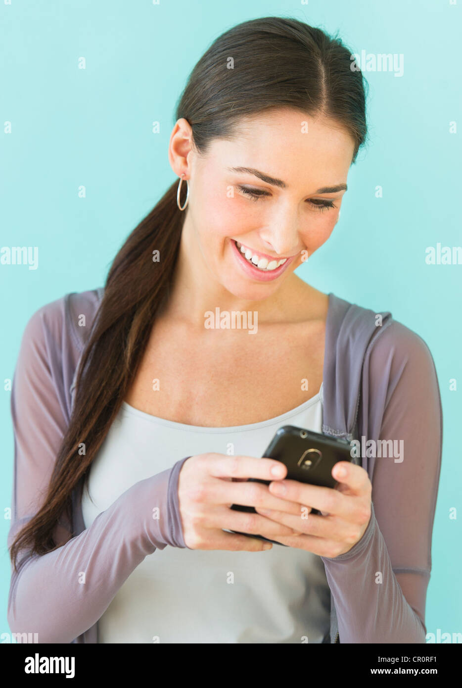 Using smartphone communication technology hi-res stock photography and ...