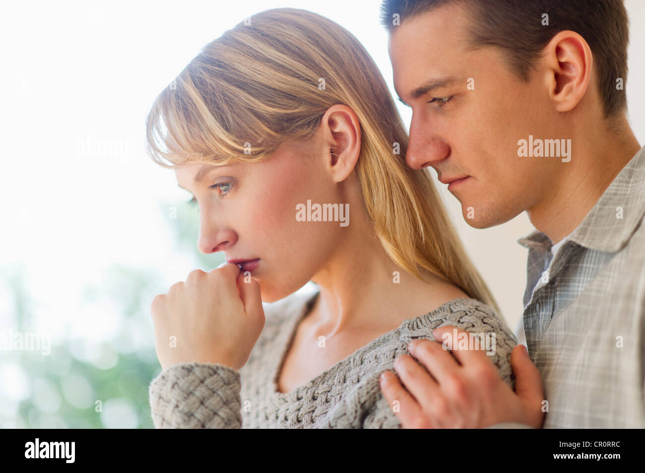 Sad couple profile hi-res stock photography and images - Alamy