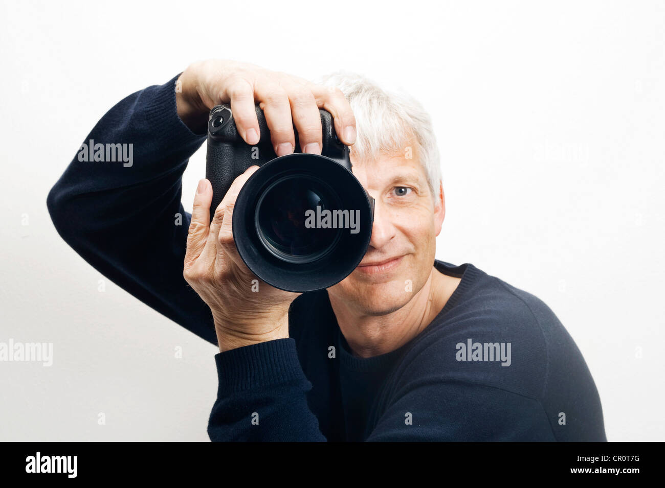 Male photographer takes pictures digital hi-res stock photography and ...