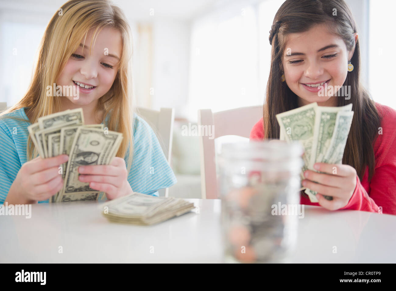 Teenager girl counting money hi-res stock photography and images - Alamy