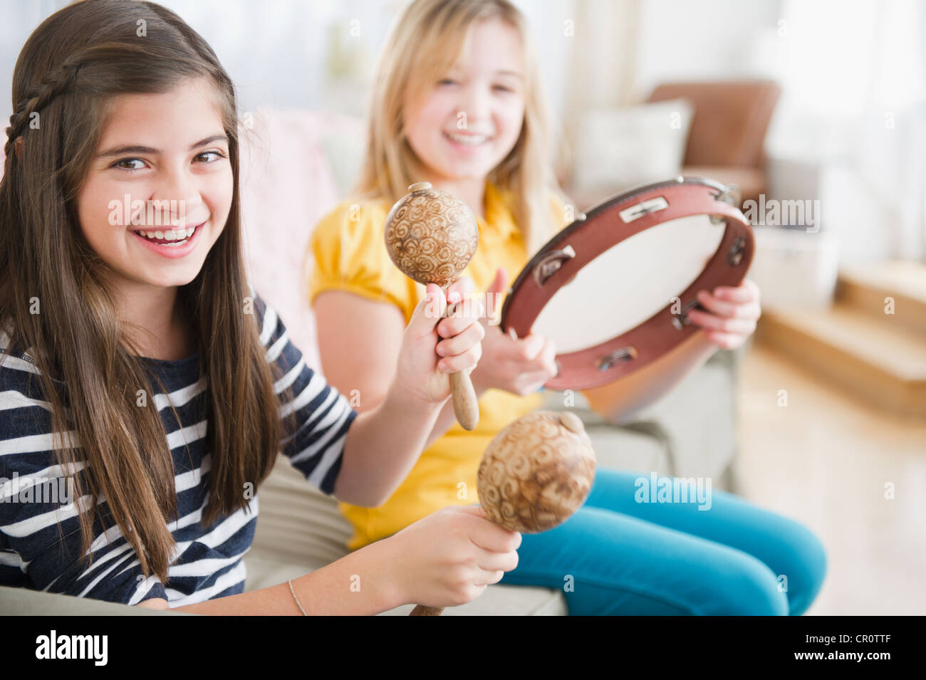 Children playing musical instruments hi-res stock photography and ...
