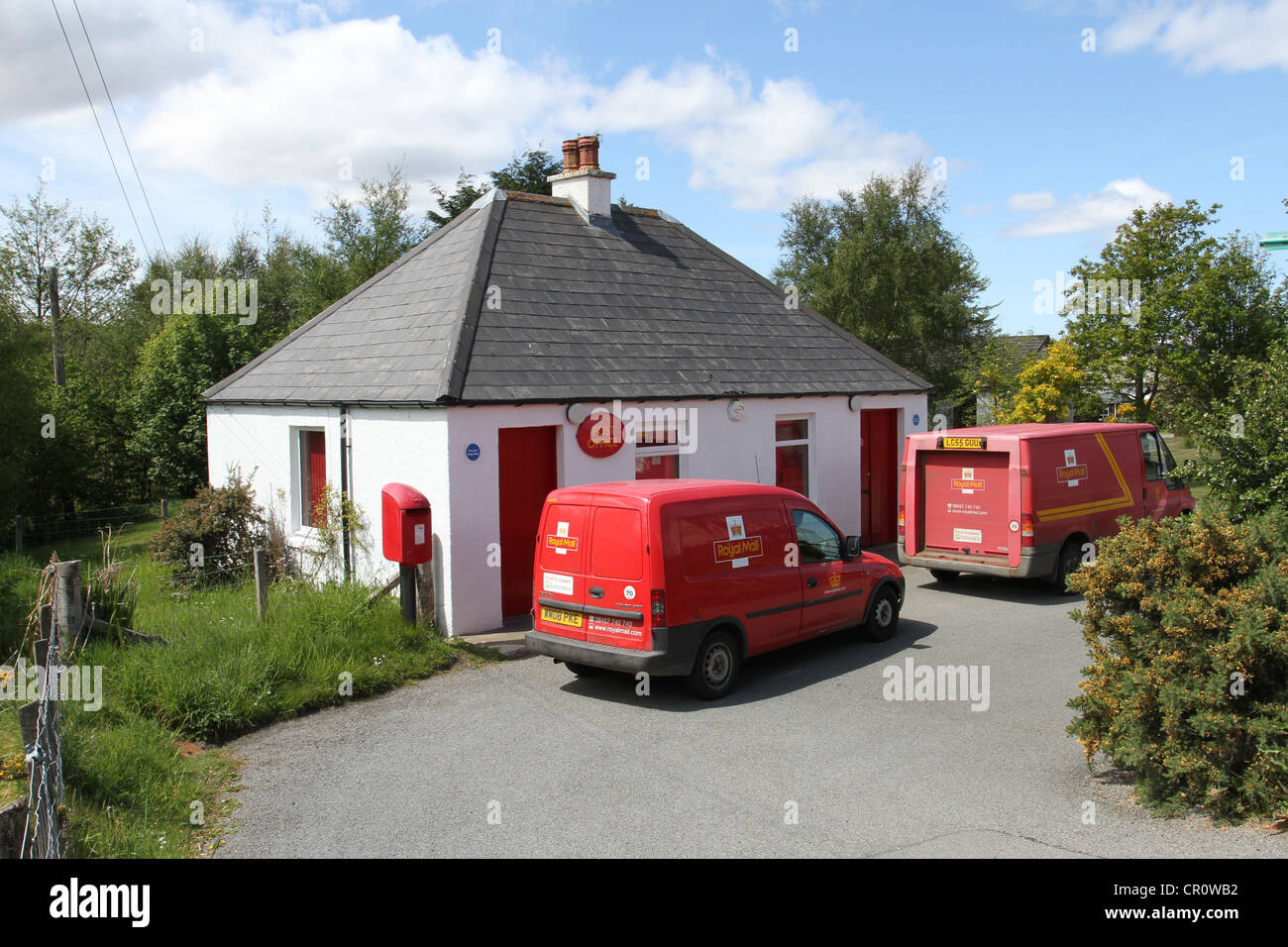 Postal vehicles outside Dunvegan Post Office Isle of Skye Scotland June ...