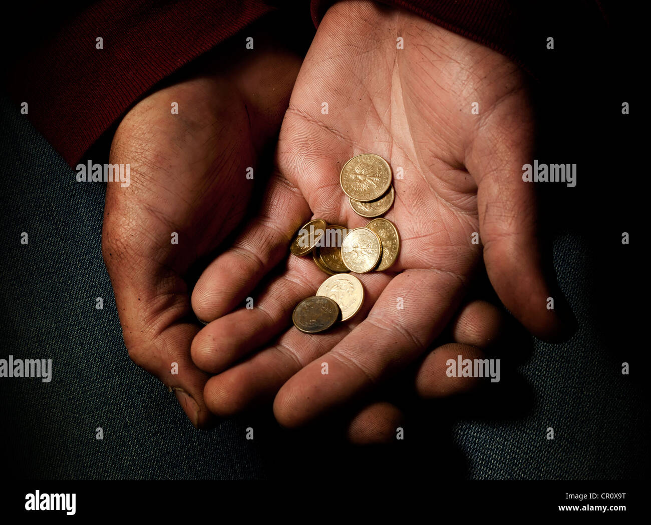 Poverty and misery last polish money in hand Stock Photo - Alamy
