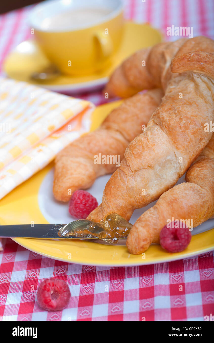 Breakfast table with croissants Stock Photo - Alamy