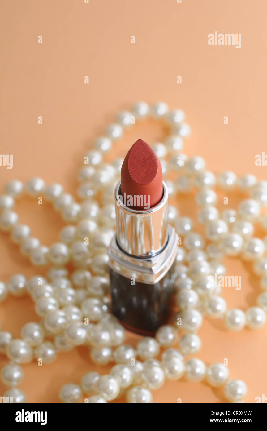 Lipstick with a pearl necklace Stock Photo - Alamy