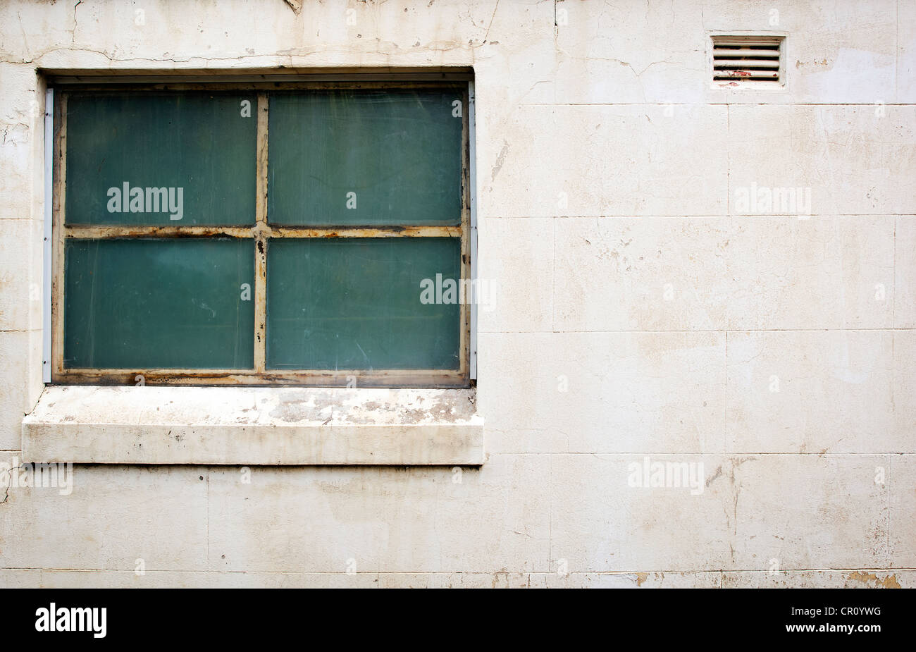 Old style window in concrete wall with copy space Stock Photo - Alamy